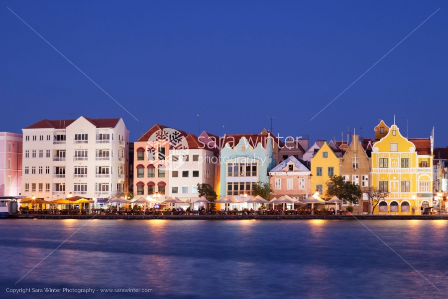 Colorful houses of Willemstad, Curaçao at night | Sara Winter Photography